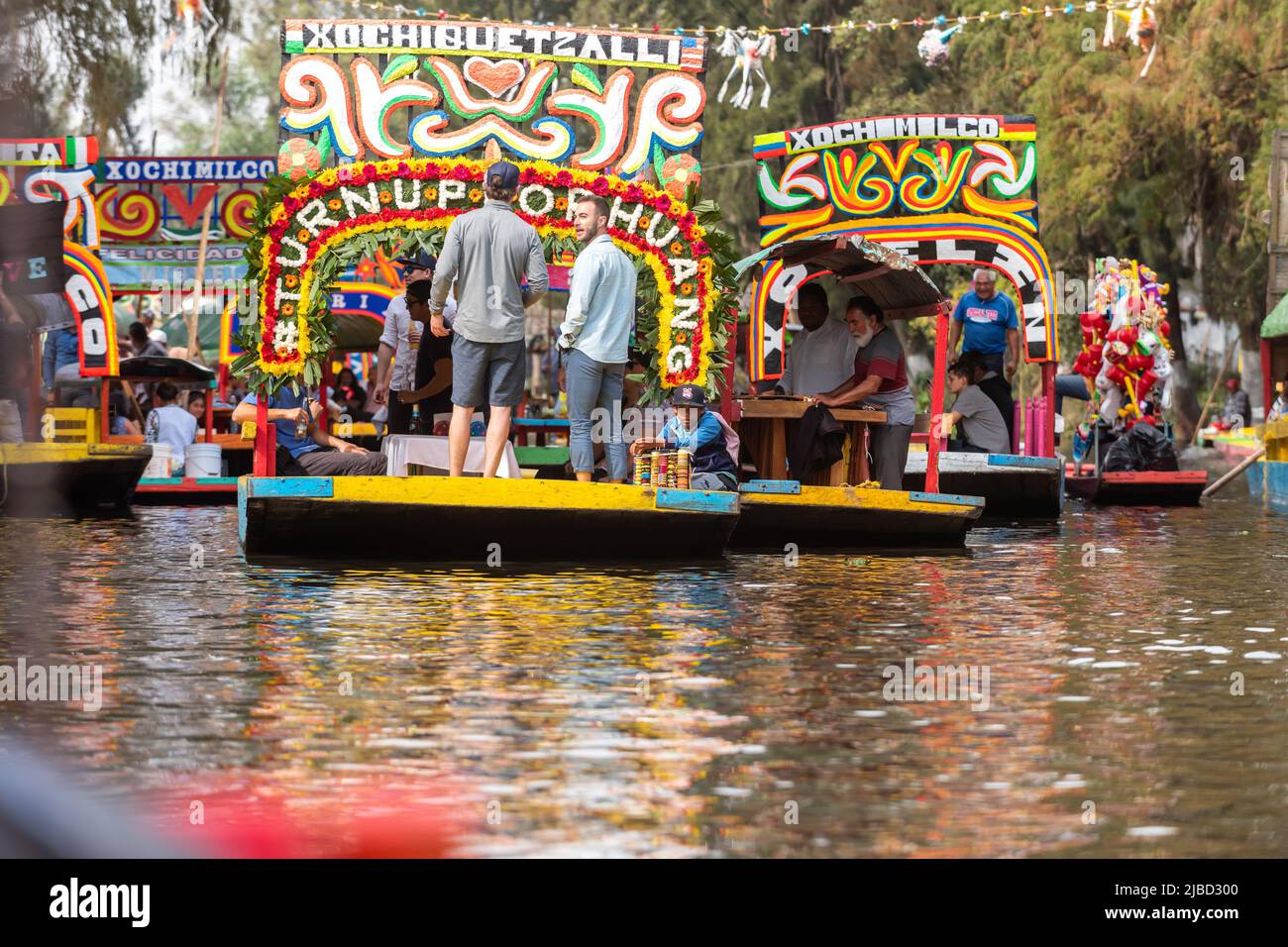 Mexico City, January 19th 2019: Families enjoying a traditional day out cruising in flat ...