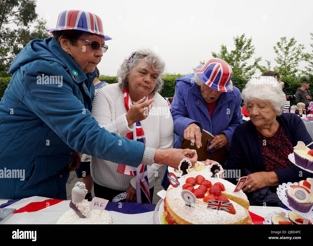 Residents of Teapot Lane in Aylesford, Kent, judge their Jubilee Bake ...