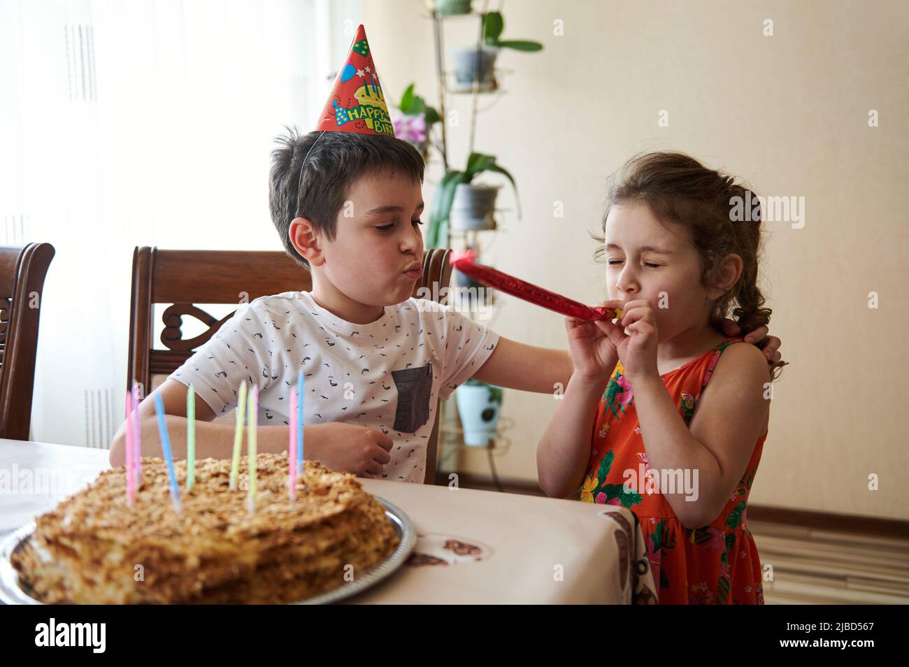 Charming adorable Caucasian kids, boy and girl, brother and sister ...
