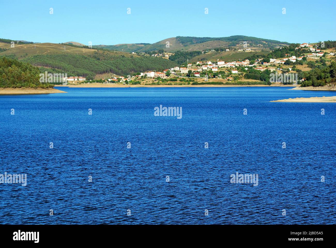 Turquoise blue water reservoir Stock Photo - Alamy