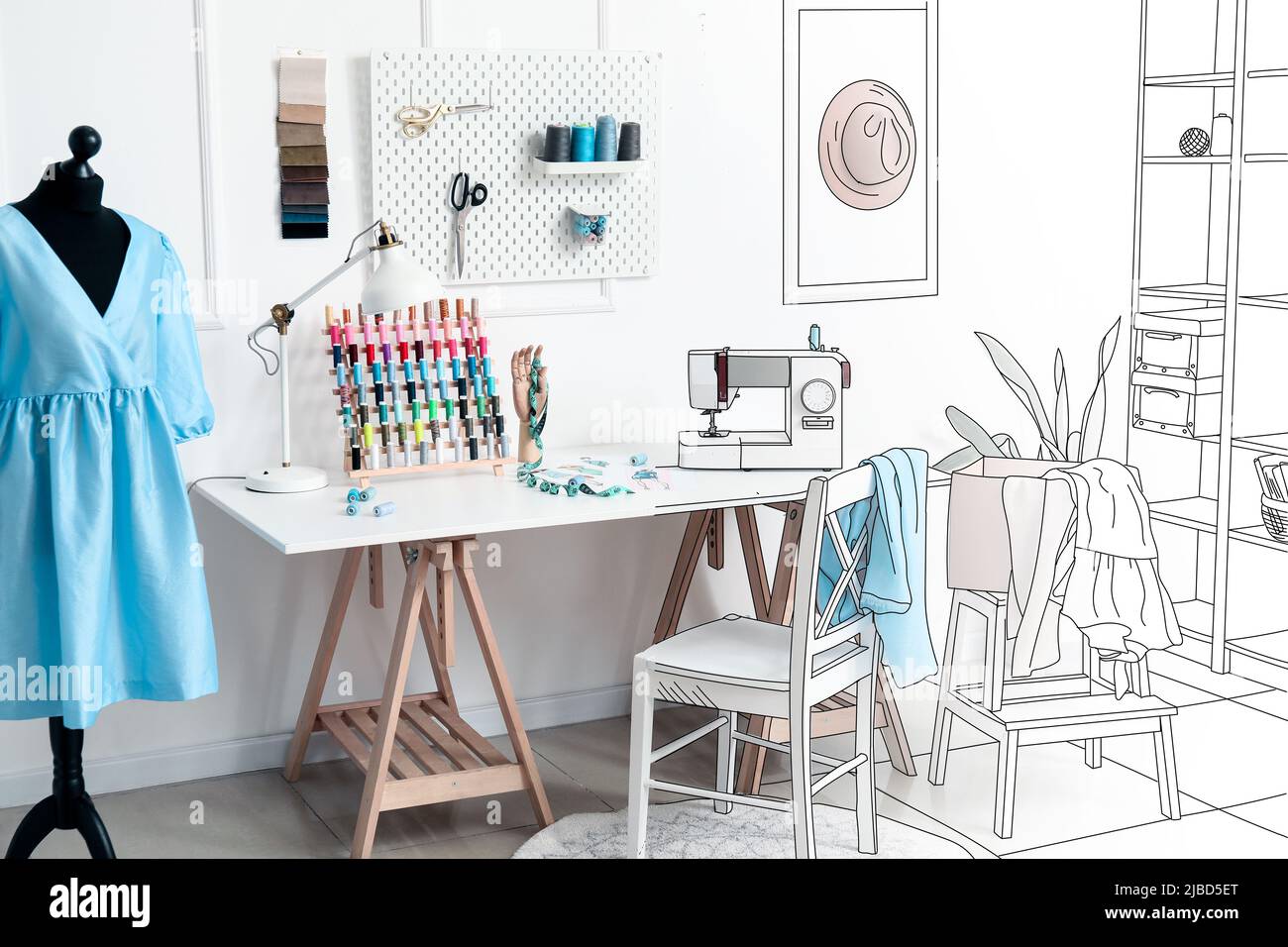 New interior of fashion designer's officer with tailor's workplace and ...