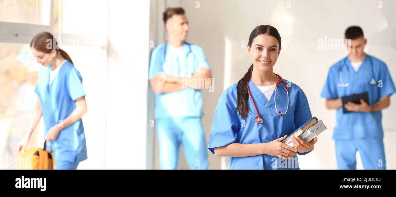 Female medical student in hall of clinic Stock Photo - Alamy