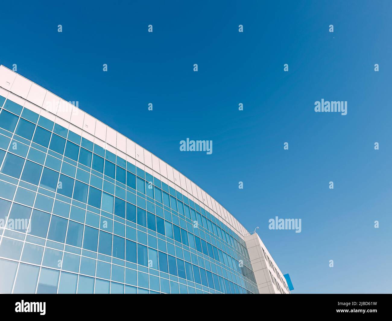 Contemporary office building over the blue sky, modern architecture ...