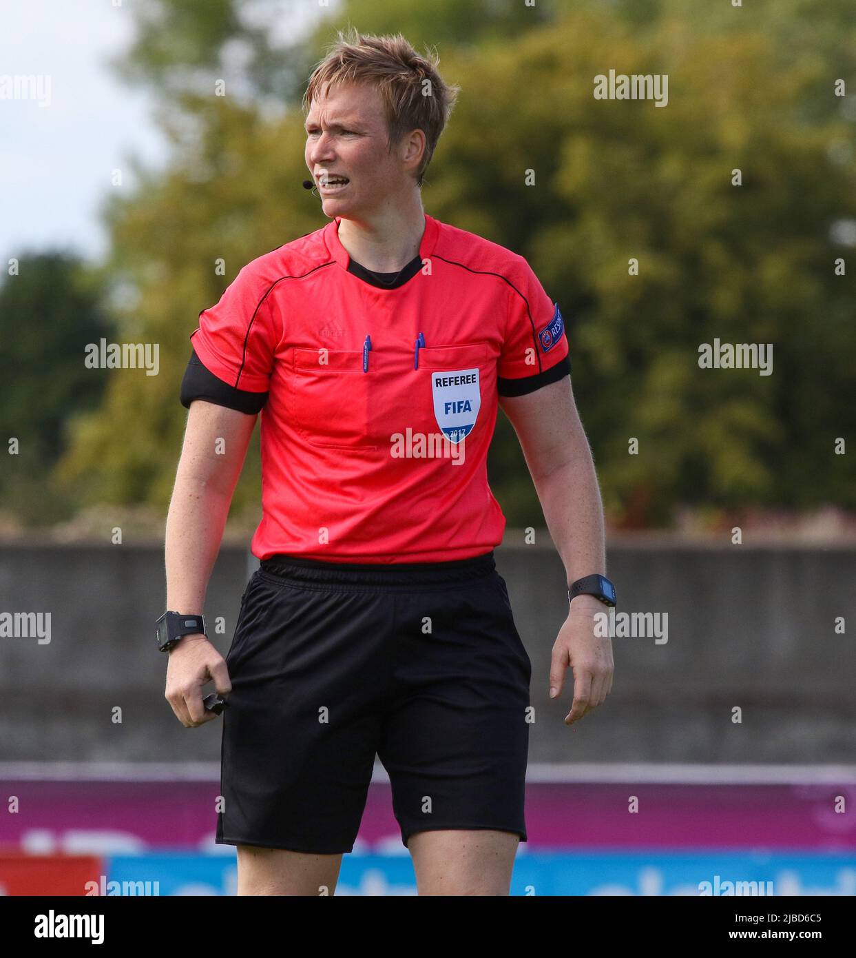 Ladies football referee red top hi-res stock photography and images - Alamy