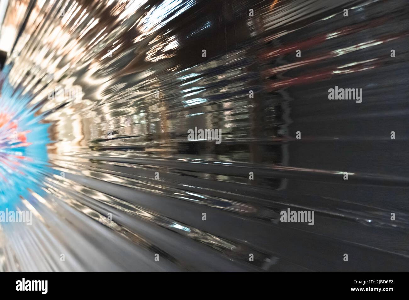 Black plastic wrap background. Crumpled wrinkled plastic cellophane ...