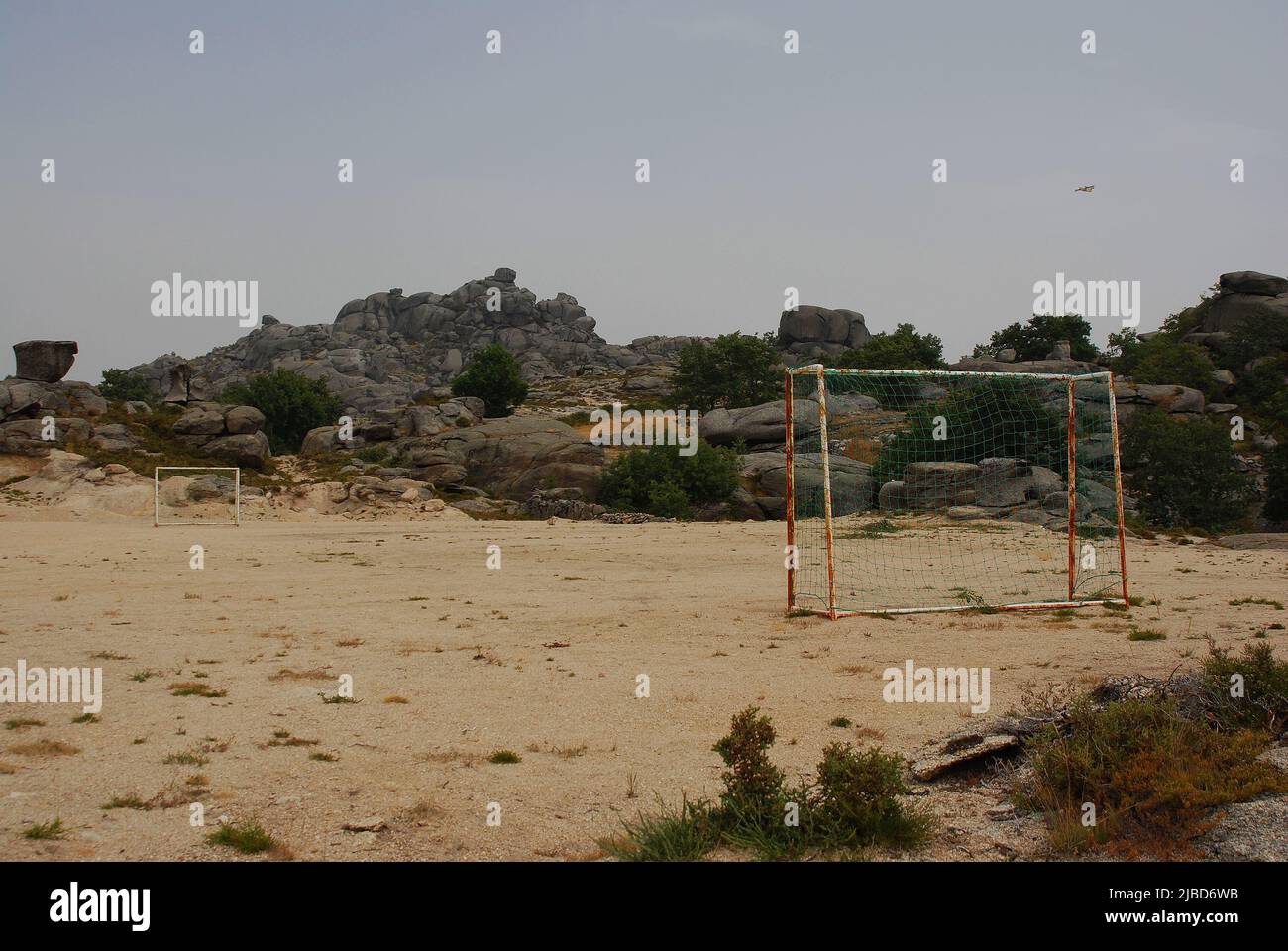 Football field on top of the granite mountain Stock Photo - Alamy