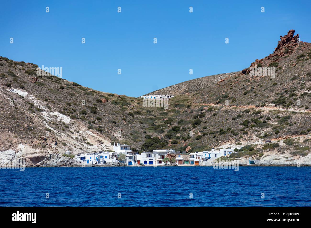 Cyclades Greece. Milos island, traditional buildings on the coast ...
