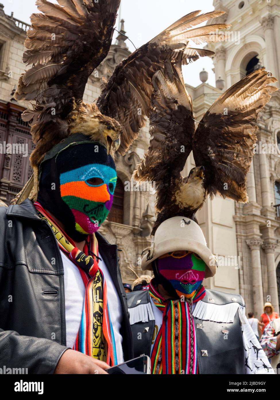 Indigenous with an eagle headdress and mask as part of Folkloric dance ...