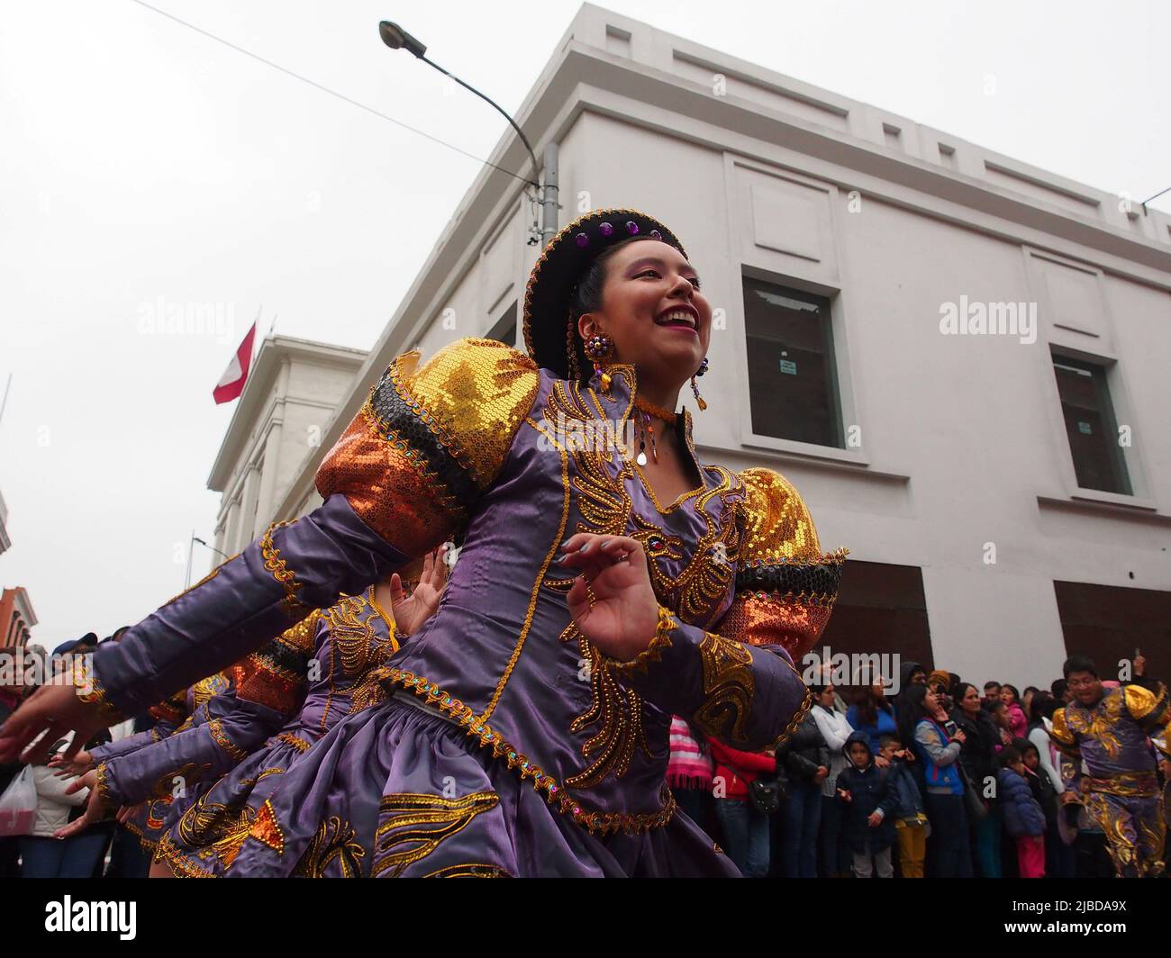 A girl performing a traditional dance of Puno. The municipality of Lima ...