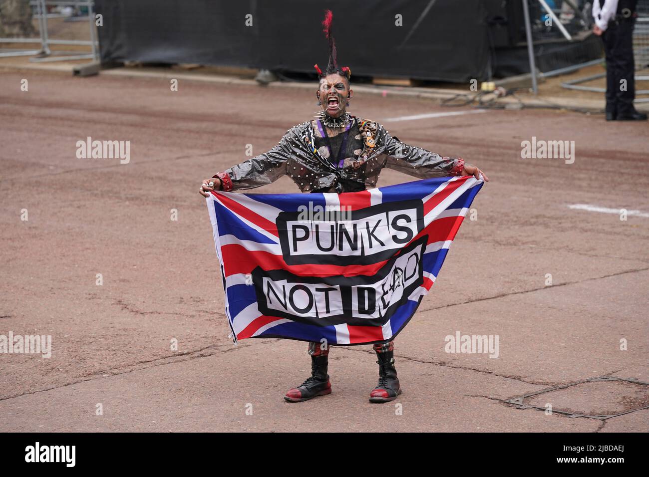 A participant dressed as a punk during the Platinum Jubilee Pageant in ...