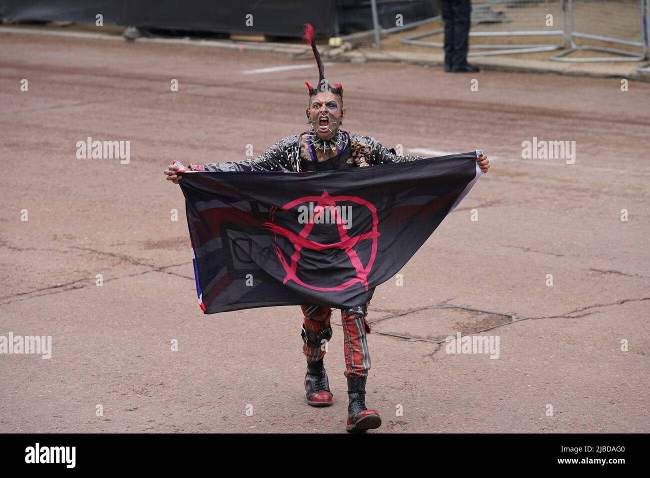 A participant dressed as a punk during the Platinum Jubilee Pageant in ...