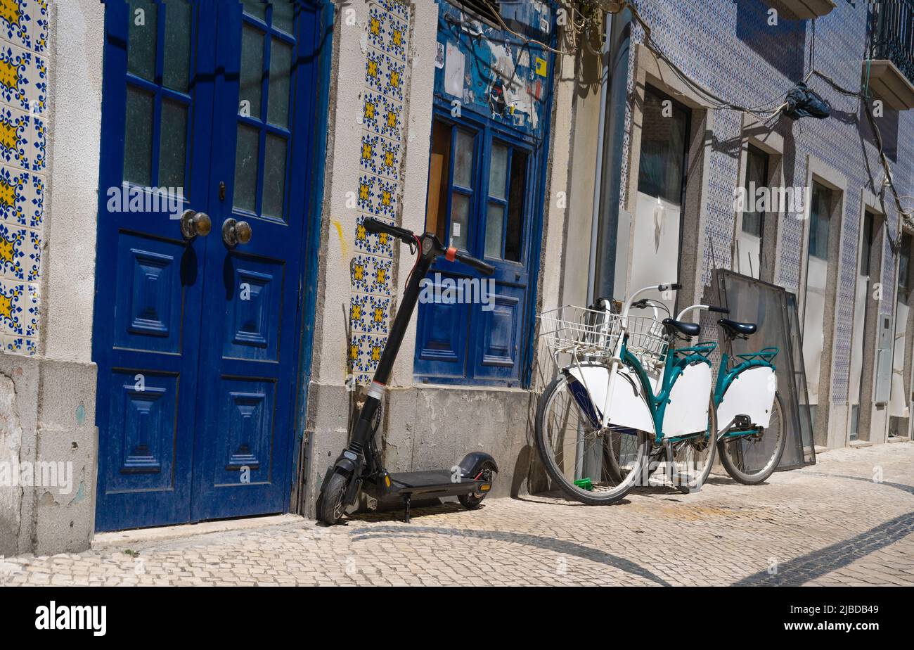 typical portugal old street with blue doors Stock Photo - Alamy