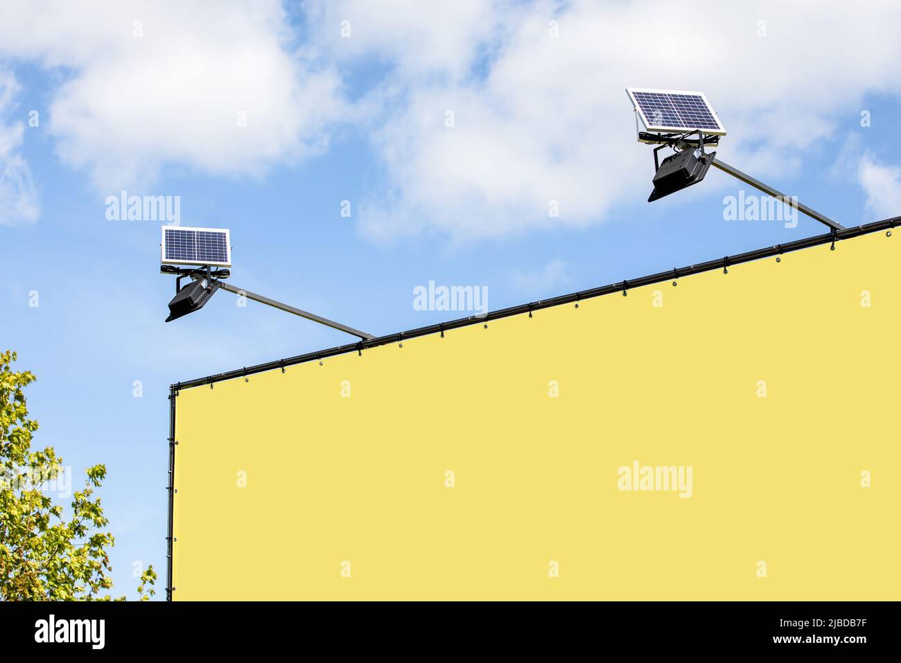 Yellow advertising banner. Led lighting and solar panels Stock Photo ...