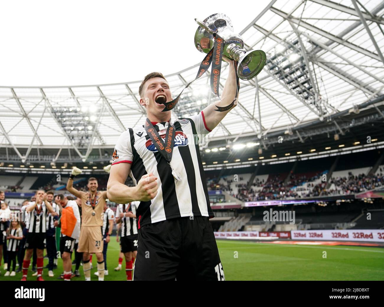 Grimsby Town’s Harry Clifton celebrates with the Vanarama National ...