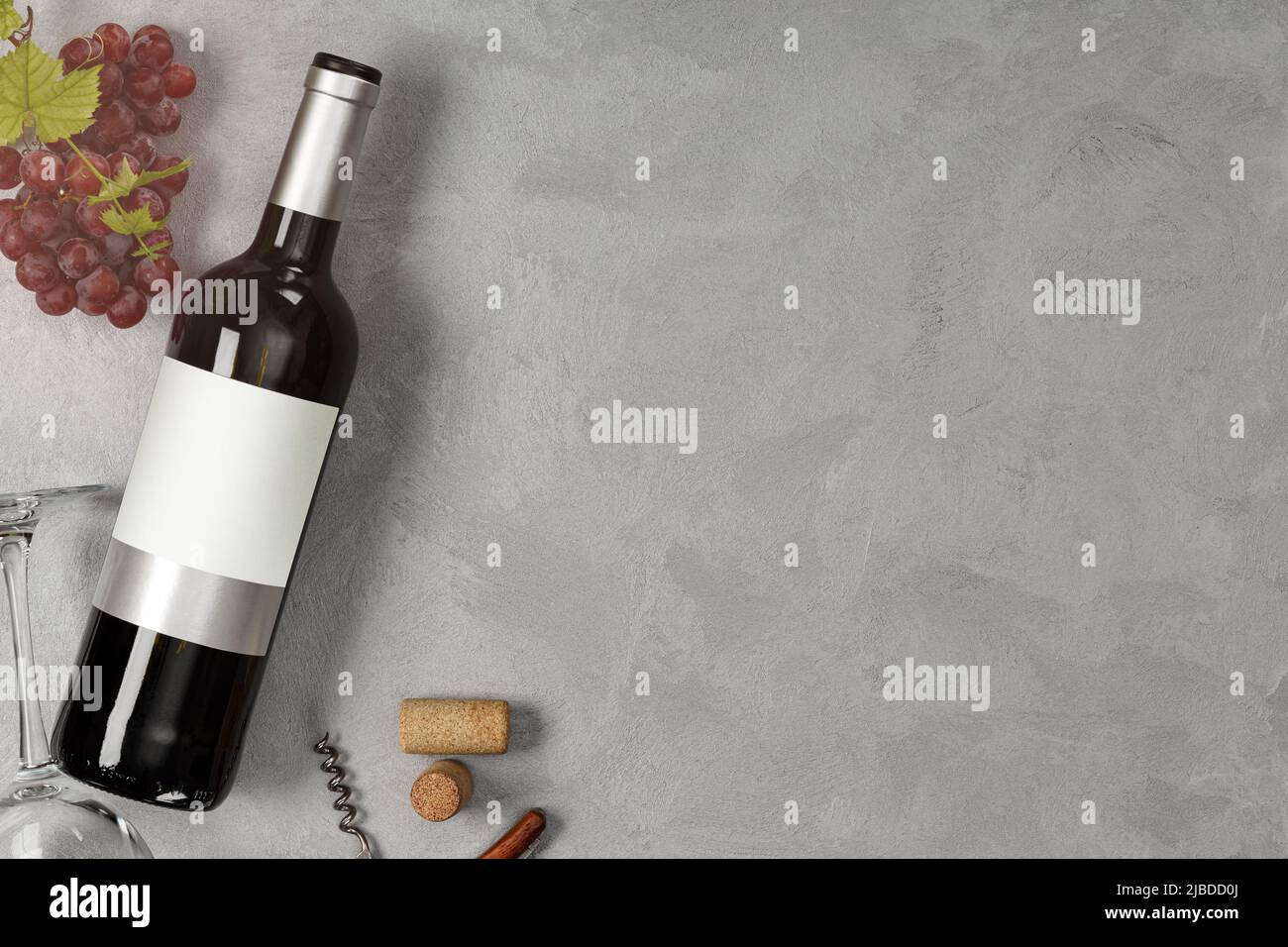 Bottle of red wine with label. Glass of wine and grape. Wine bottle ...