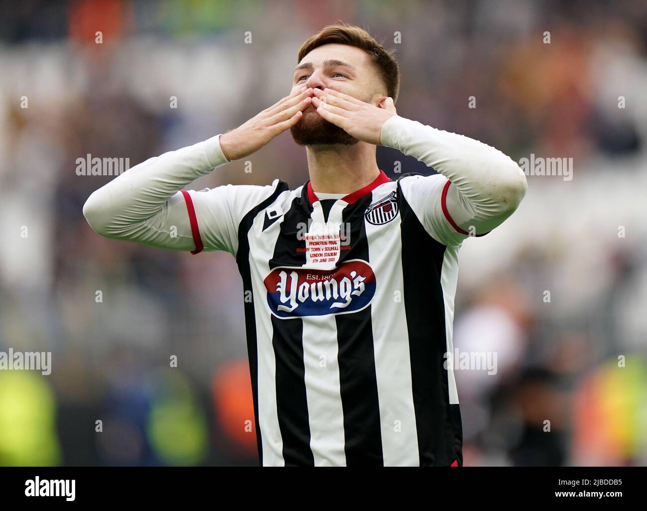 Grimsby Town’s John McAtee celebrates at full time after after their ...