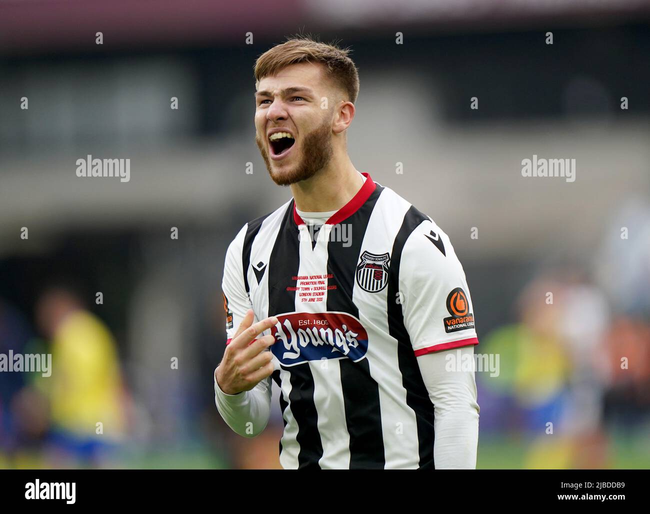 Grimsby Town’s John McAtee celebrates at full time after after their ...