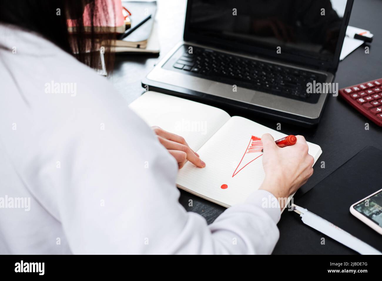 Accounting Challenges. Accountant, auditor draws an exclamation mark in ...