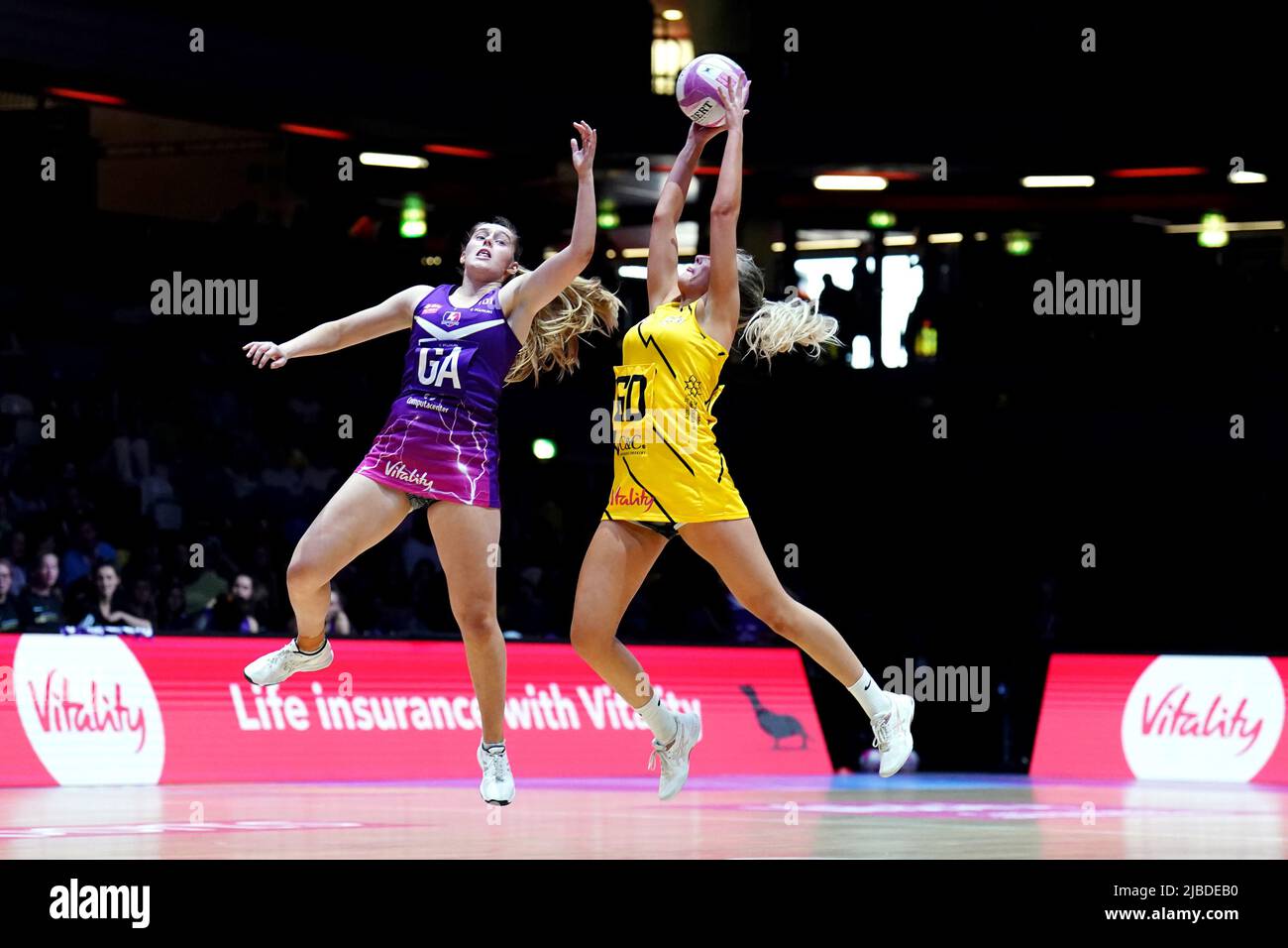 Manchester Thunder's Millie Sanders, (right) catches the ball ahead of ...
