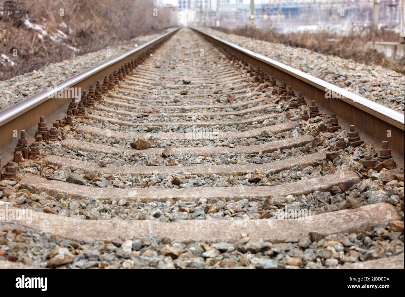 Parallel rails, converging on each other in a blur on the horizon, are ... Parallel rails, converging on each other in a blur on the horizon, are ...