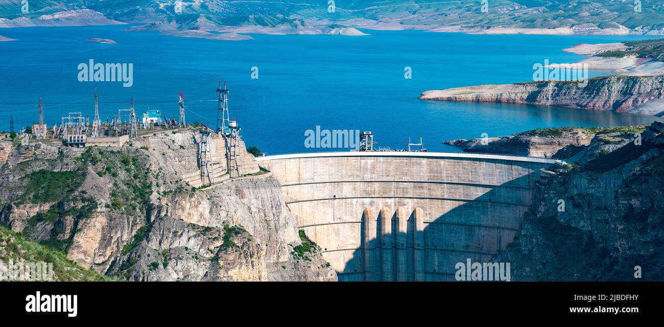 upper part of huge arch dam of the hydroelectric power station and the ...