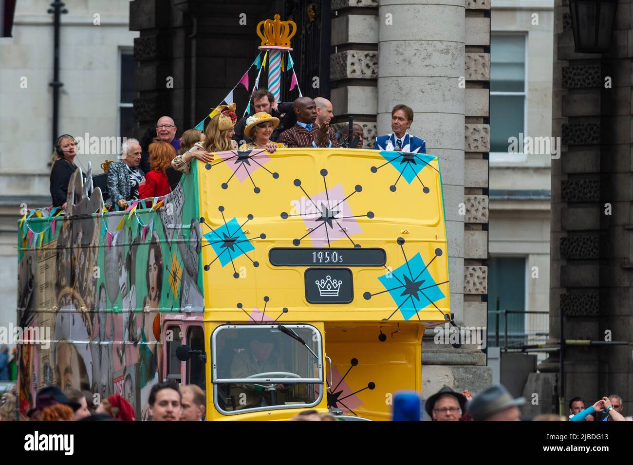 London, UK. 5 June 2022. An open top bus representing the 1950s passes ...