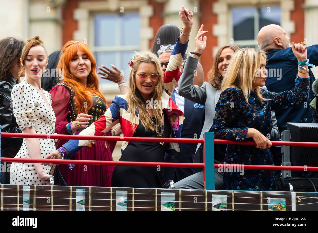 London, UK. 5 June 2022. Kate Moss and Patsy Kensit on an open top bus ...