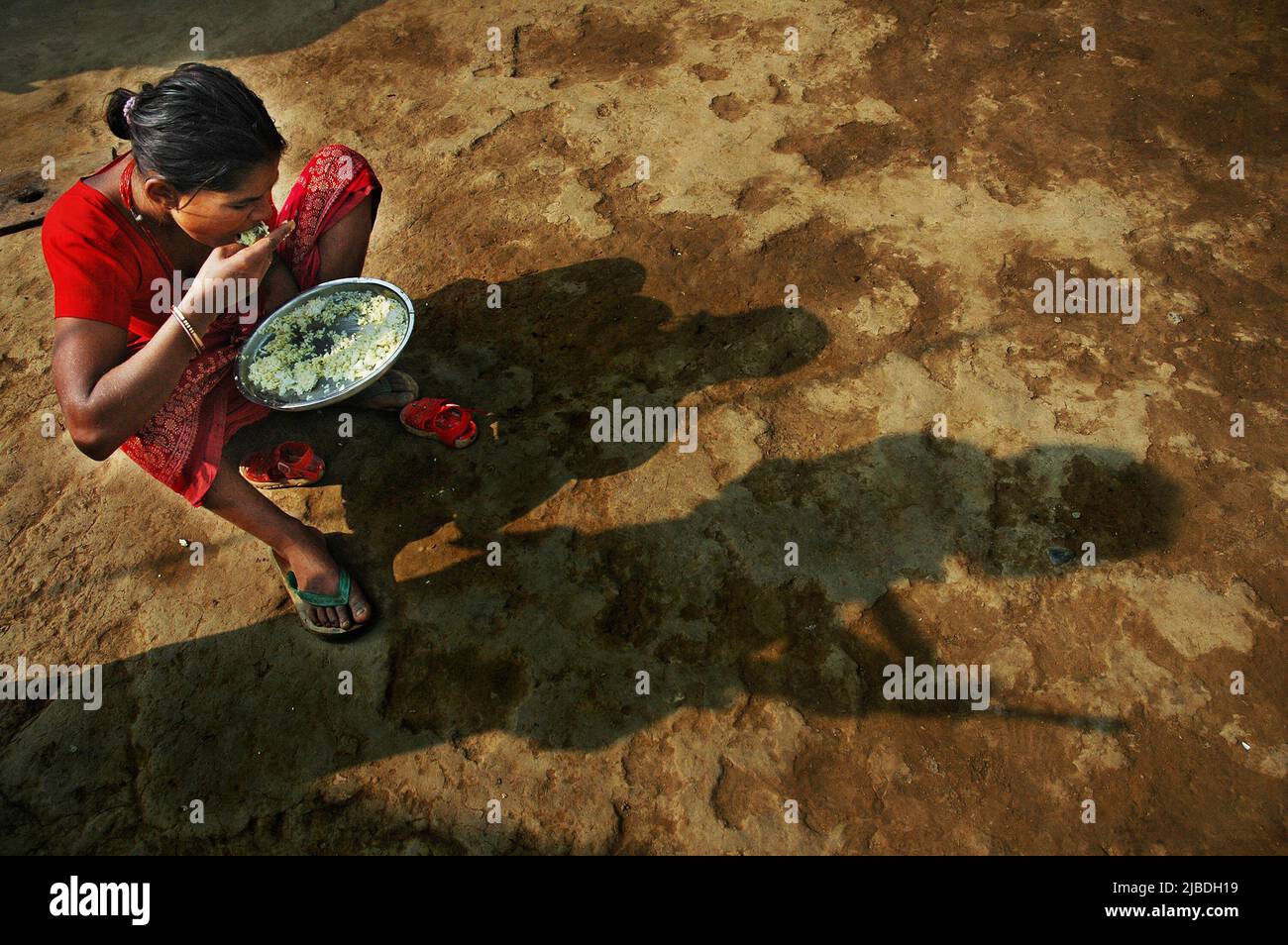 Women eating her lunch. Bangladesh Stock Photo - Alamy