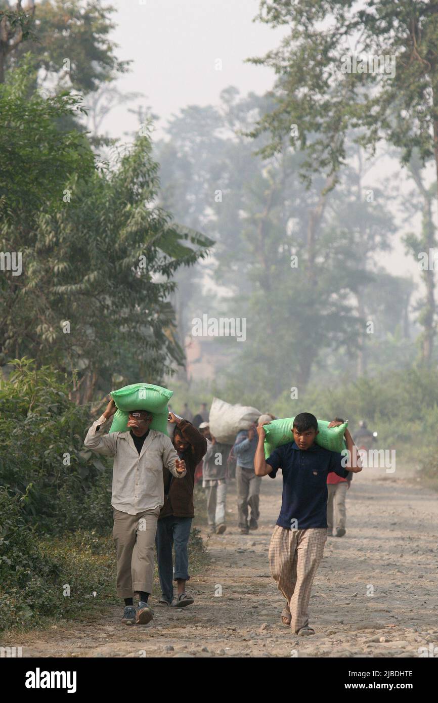 Collecting sand bags to build bunkers for forces. Bangladesh Stock ...
