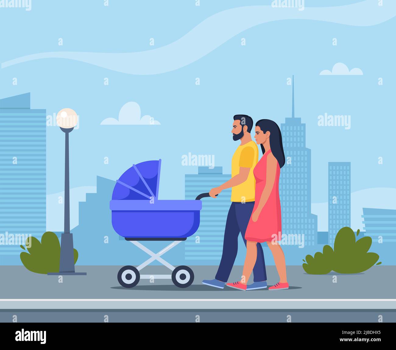 Young parents walking with stroller. Happy family having fun together ...