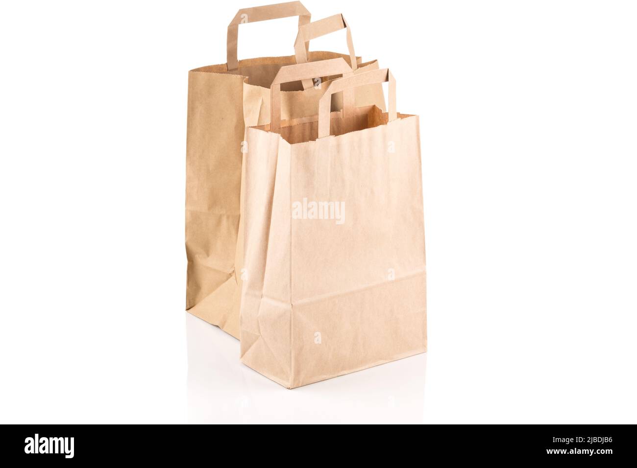 Simple paper bag isolated on a white background Stock Photo - Alamy