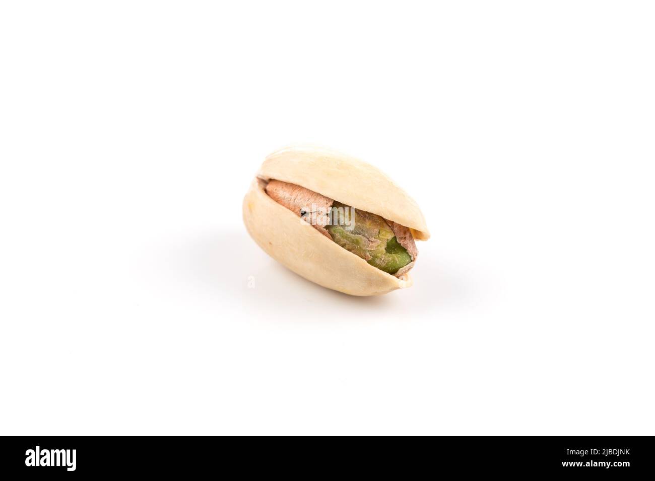 pistachio nut in shell close up isolated on white background Stock ...