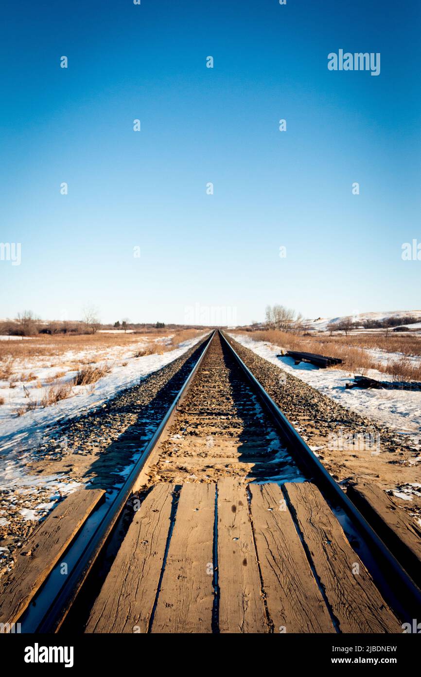 Old train tracks running through the Canadian prairies Stock Photo - Alamy