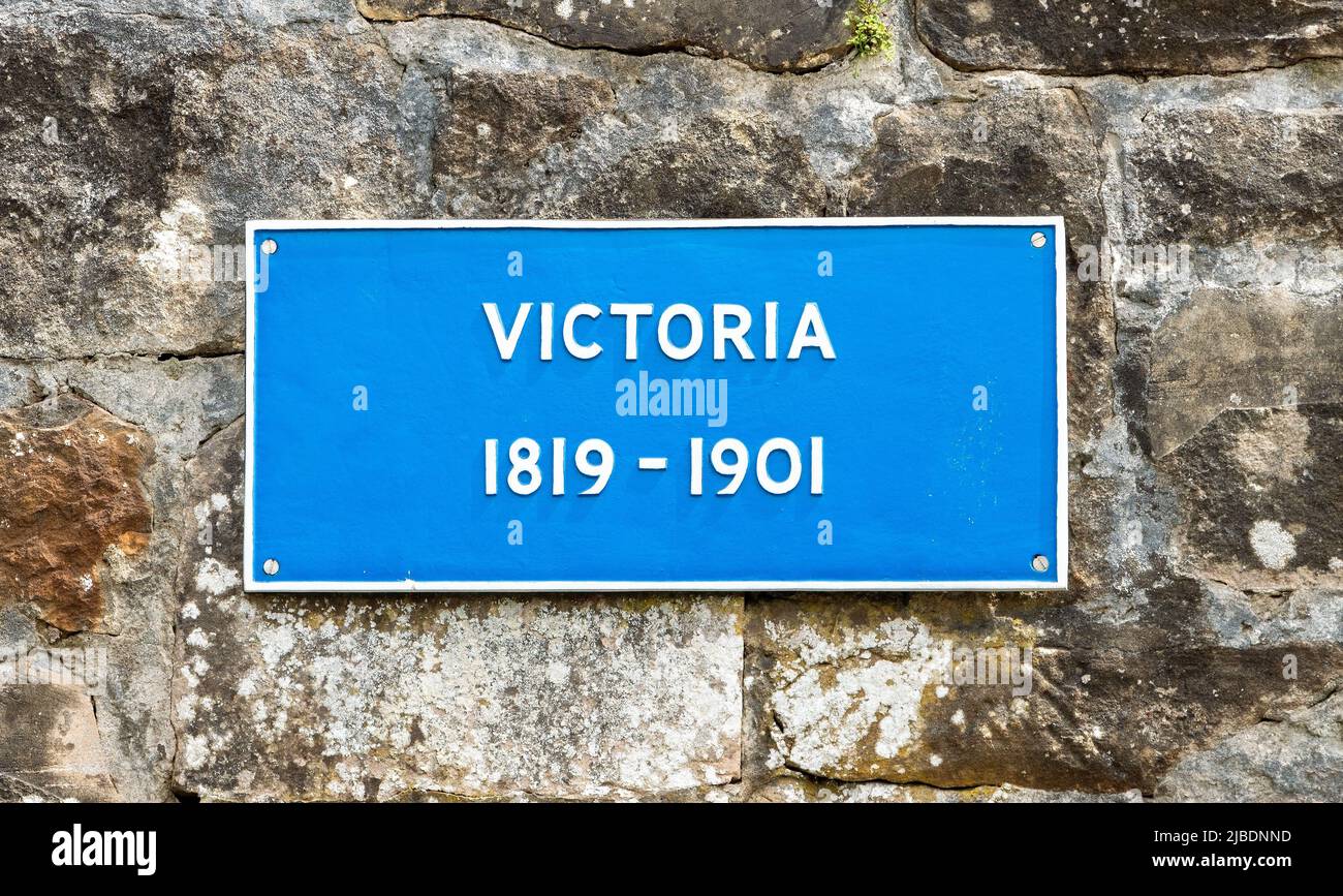 Plaque on a wall near Linlithgow Palace showing the Queens from past to ...