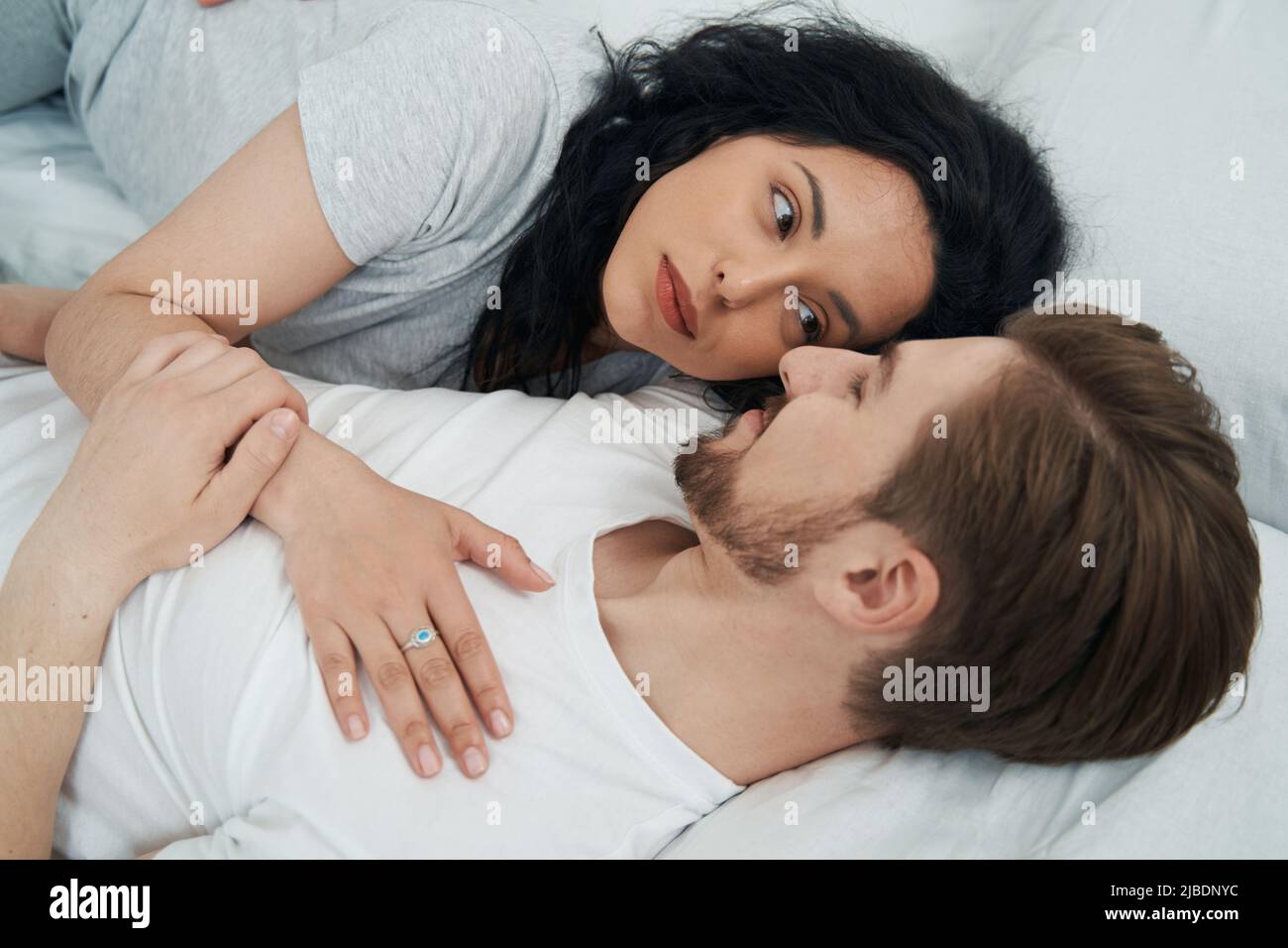 Loving lady and her life companion in bedroom Stock Photo - Alamy