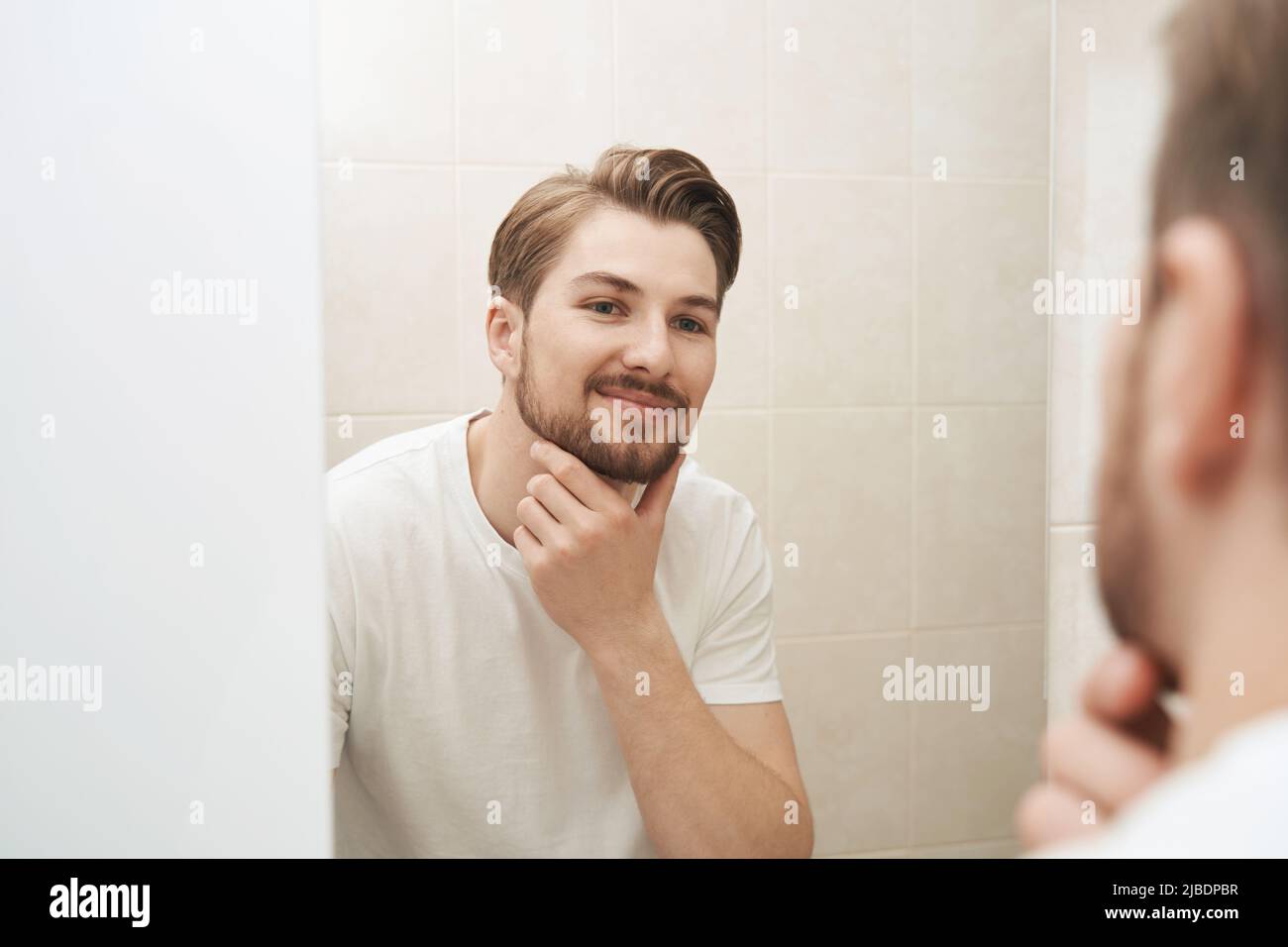 Man alone standing bathroom hi-res stock photography and images - Alamy
