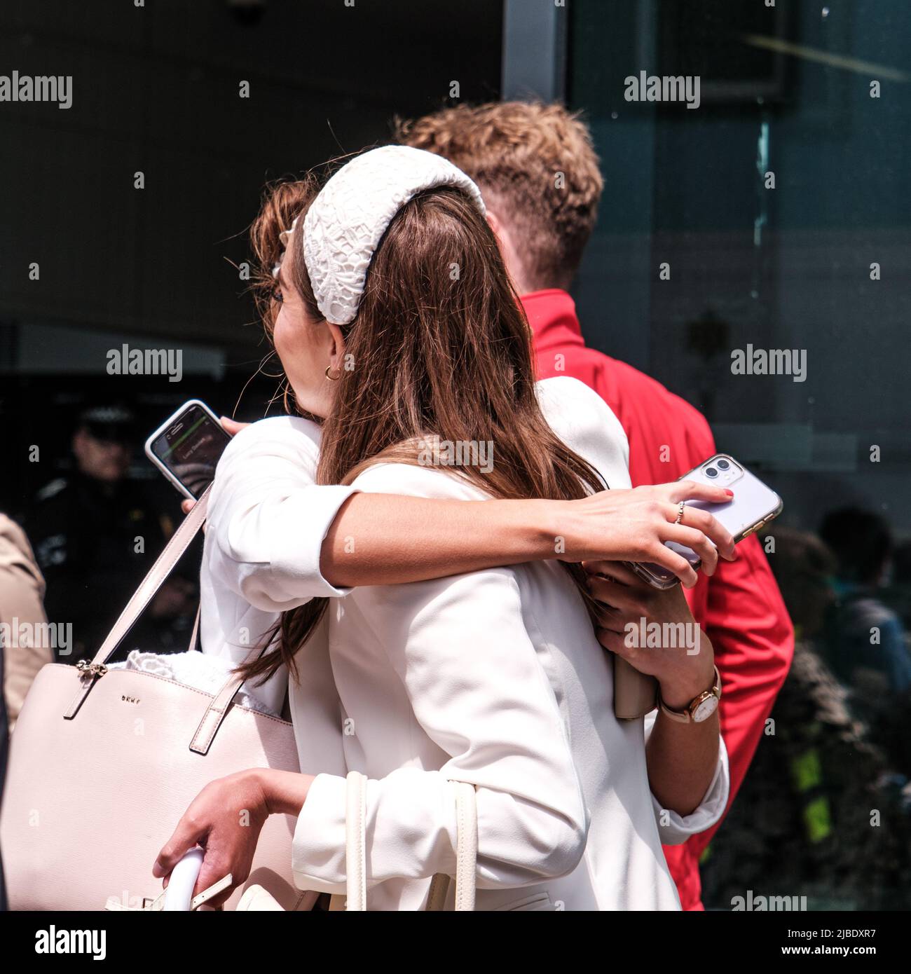 Mobile hugging hi-res stock photography and images - Alamy