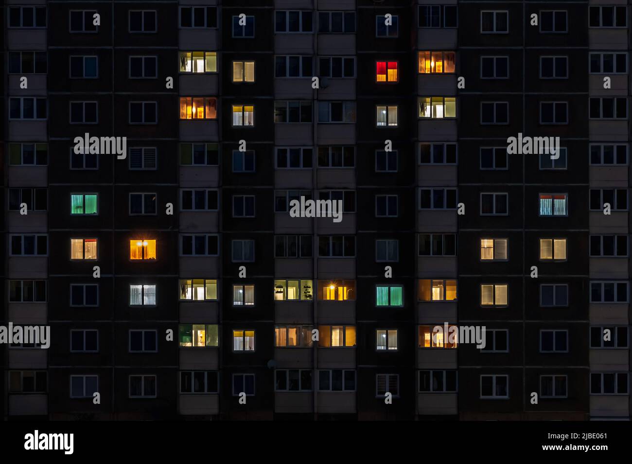 flat night panorama of multicolor smile face light in windows of ...