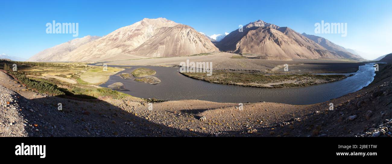 Panj river and hindukush mountains panoramic view. Panj is upper part ...