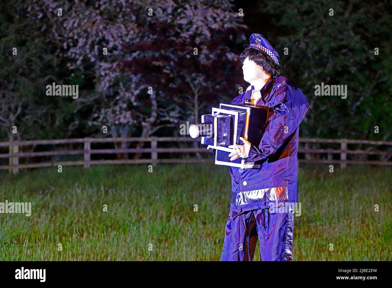 Fake police officer with speed gun hi-res stock photography and images ...