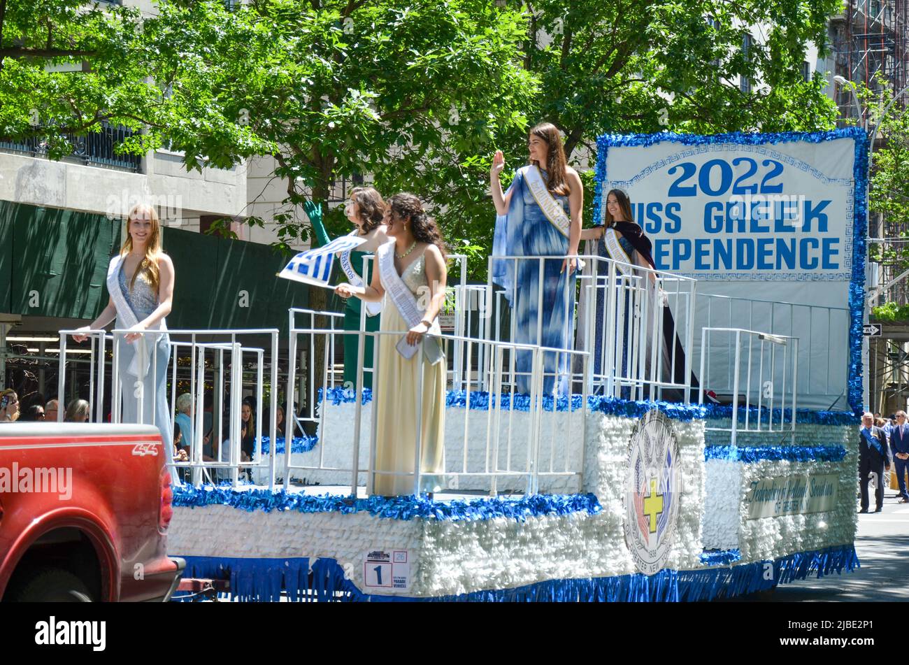 Miss Greeks are seen on a parade float driving through Fifth Avenue ...