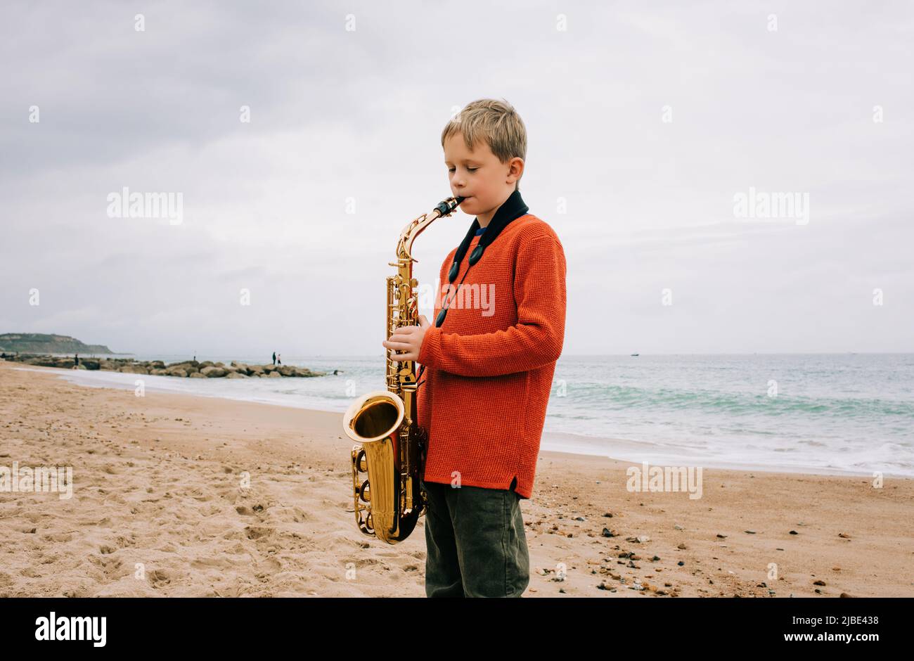 Children playing saxophone hi-res stock photography and images - Alamy