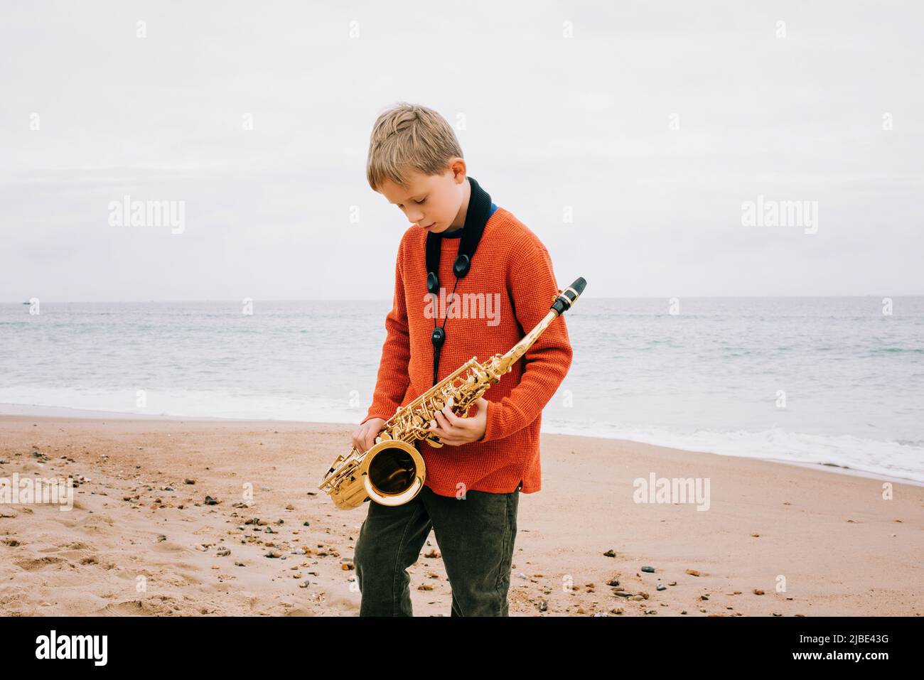 Children playing saxophone hi-res stock photography and images - Alamy