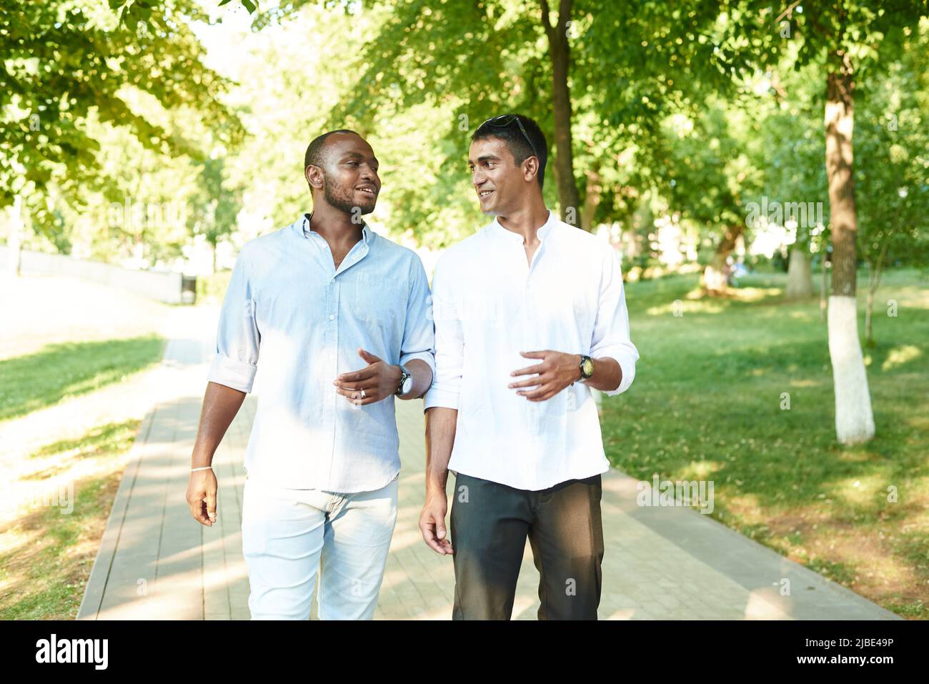 Two black men are speaking. Friendship between black man Stock Photo ...