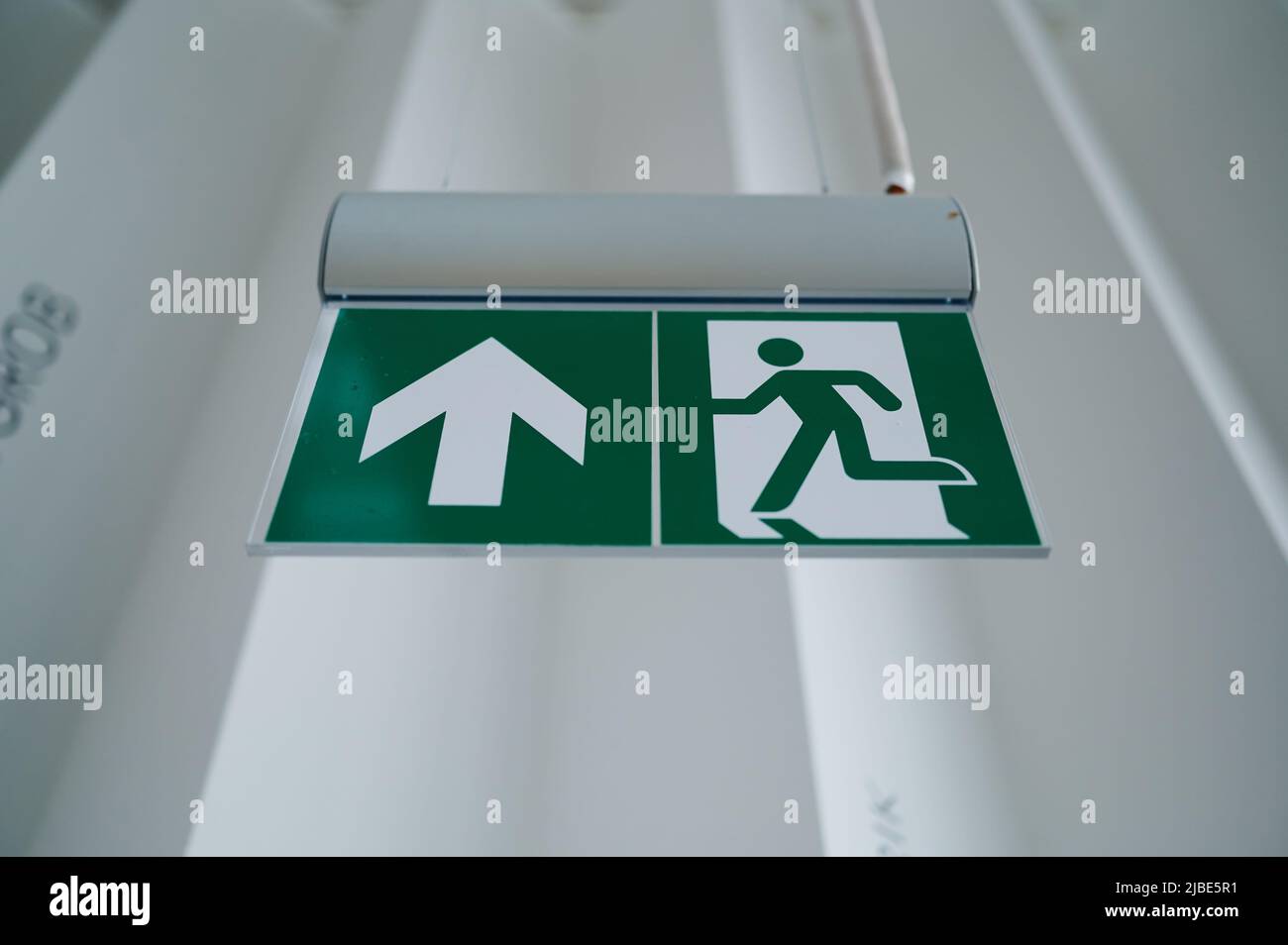 ceiling sign exit entrance , graphic symbol, movement indicator in the ...