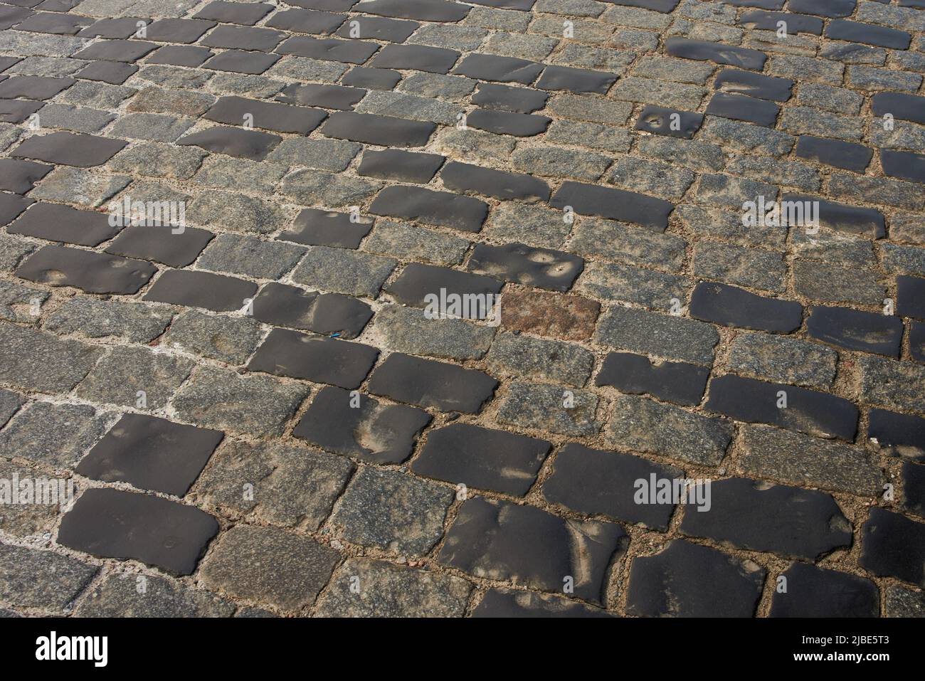 rough old paving stone, stone road element Stock Photo - Alamy