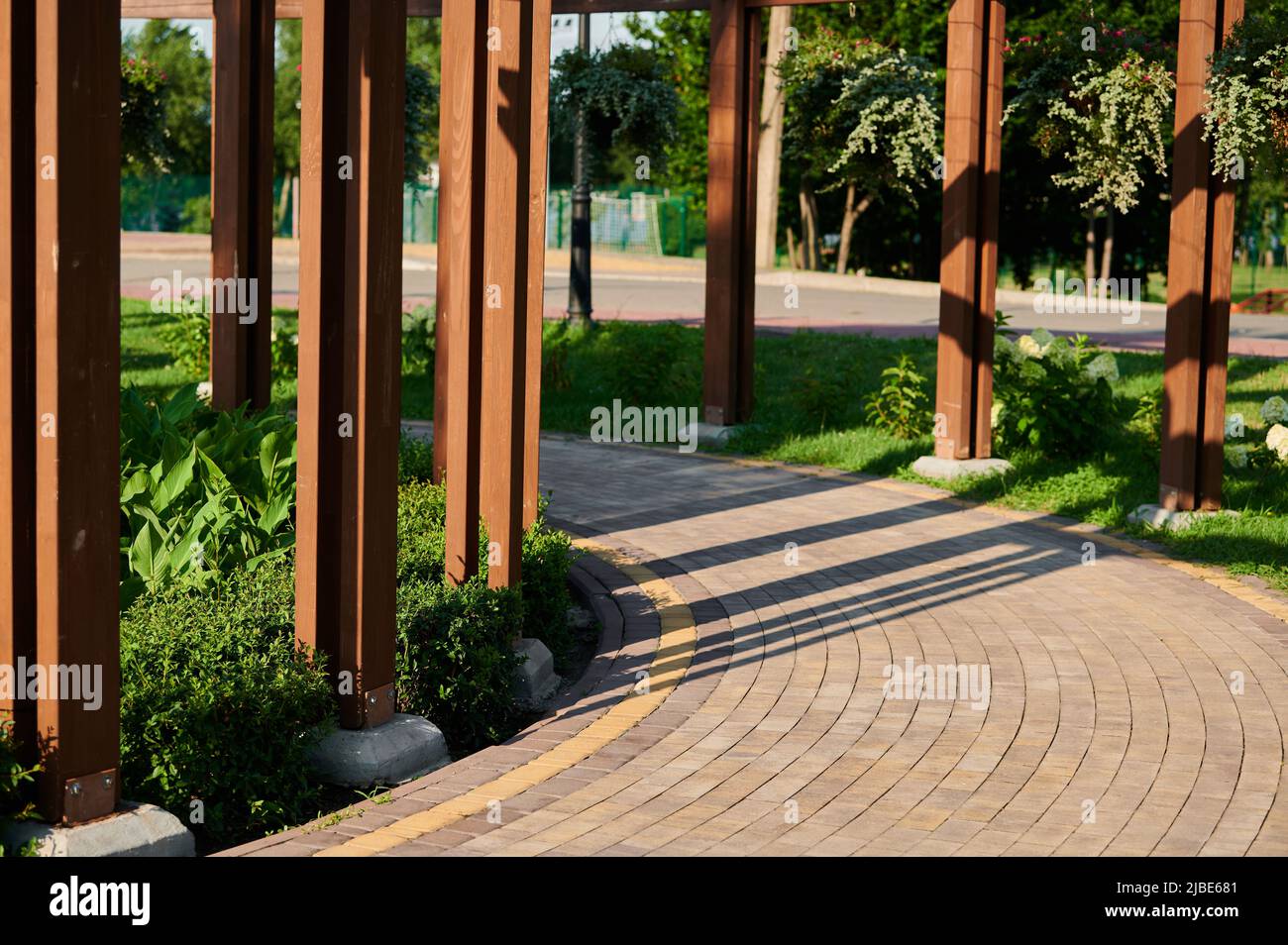 Paving stone paths with colored red and yellow bricks with bicycle ...