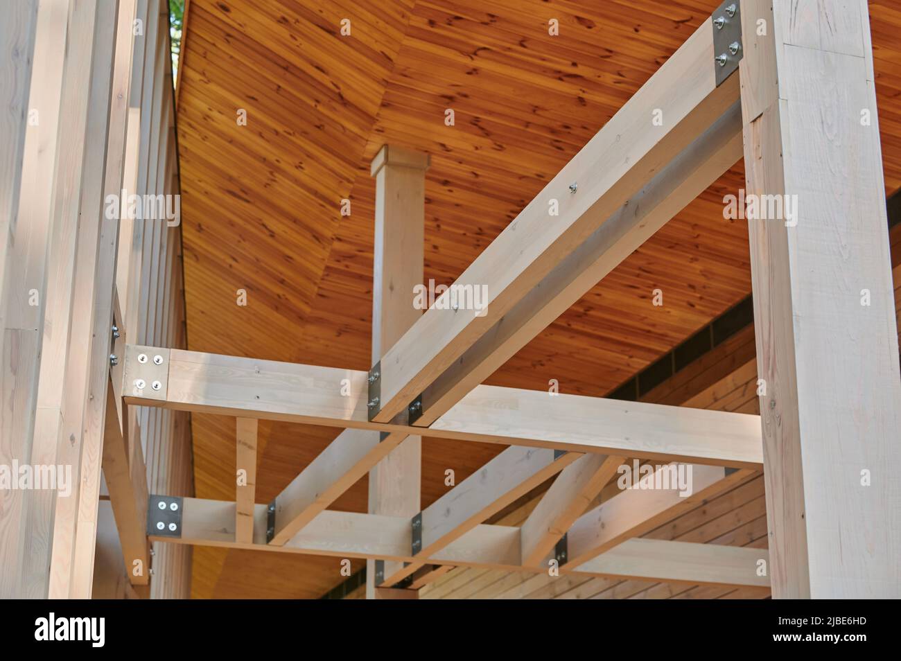 Construction of a wooden beam in interior decoration with metal ...