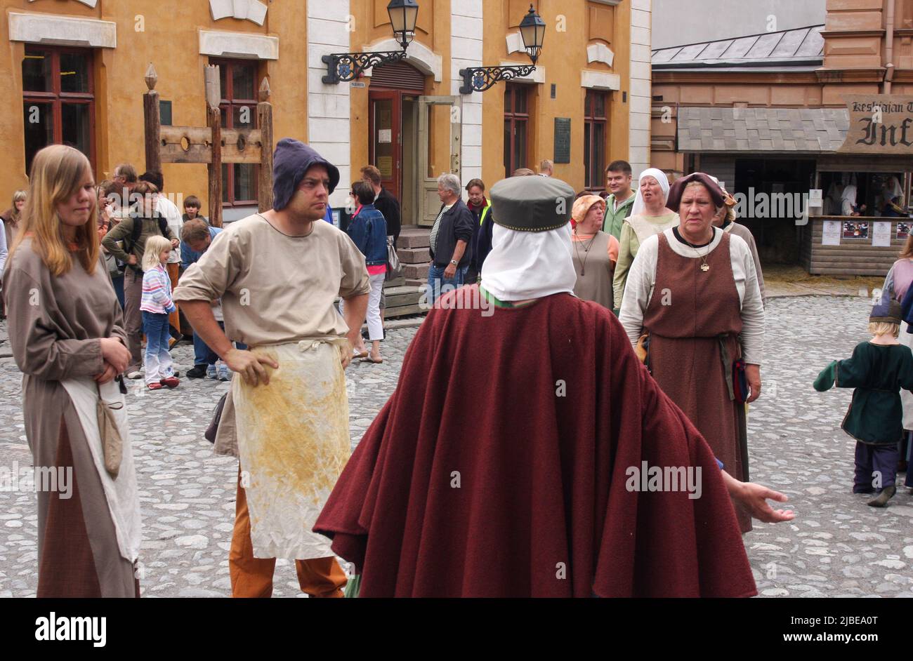 Actors in period costume giving medieval drama re-enactment at the June ...