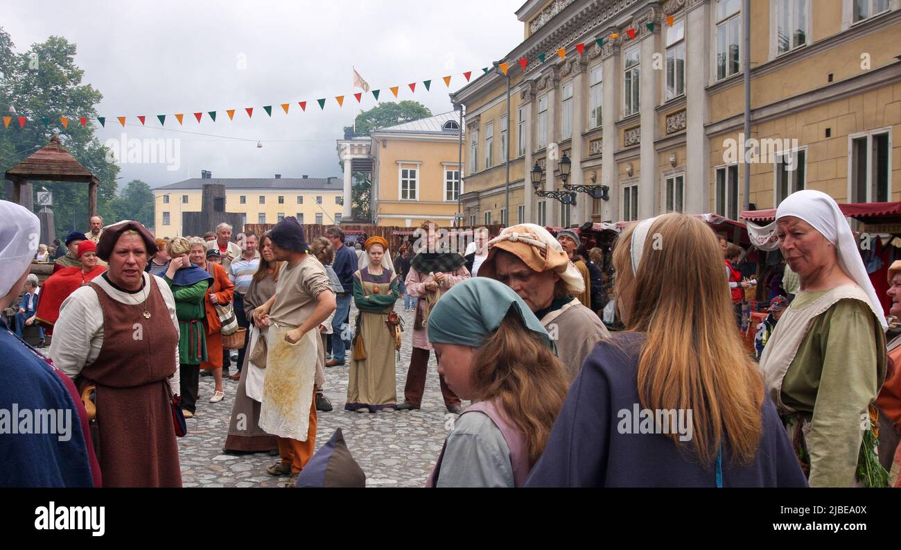 Actors in period costume giving medieval drama re-enactment at the June ...